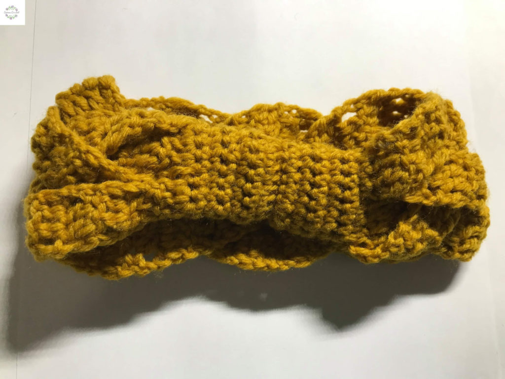 Cache oreille au crochet la tresse à quatre brins - Serena Crochet